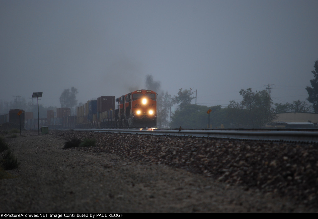 BNSF 6656 pokes her nose through the drizzle and fog 3 hours later after leaving Sunny Barstow, CA.